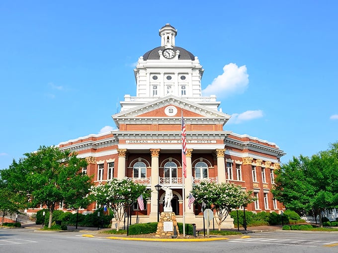 The Morgan County Courthouse stands like a proud Southern belle, her dome gleaming in the sunshine as she watches over her beloved town.