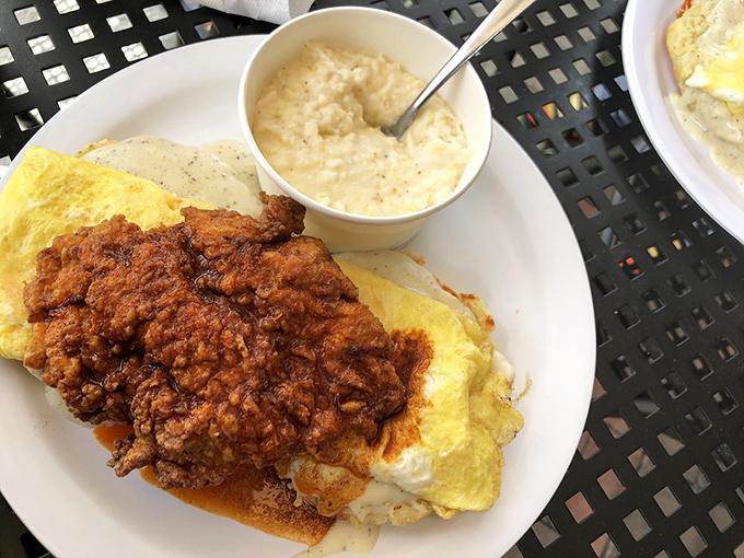 Nashville brings the heat to Marietta with this crispy fried chicken perched atop fluffy eggs&mdash;comfort food with an attitude.