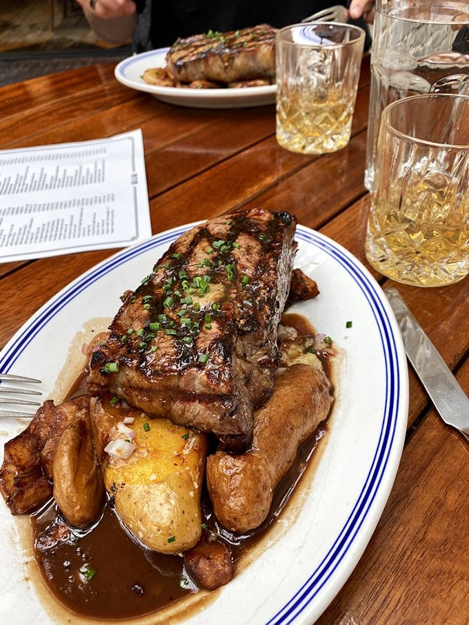 When your steak arrives with potatoes bathing in that glorious reduction, paired with a proper whiskey&mdash;life achievements unlocked.