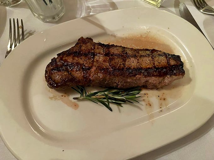 That cross-hatch grill mark deserves its own Instagram account. The rosemary sprig isn't decoration &ndash; it's aromatherapy for carnivores.