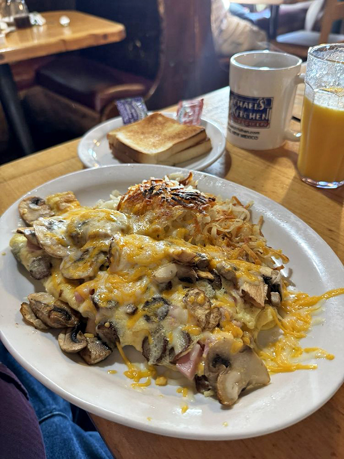 When cheese meets ham meets mushrooms in an omelet spectacular, you understand why people wake up early and wait in line at Michael's.