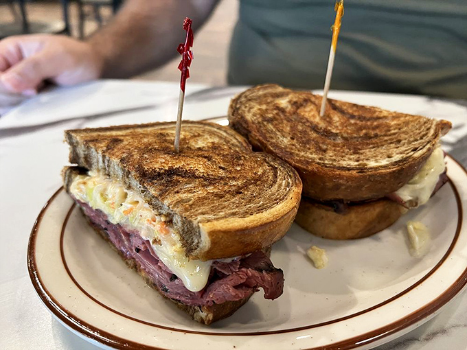 Pastrami so good, it might just convince you to trade your cowboy hat for a Yankees cap. These sandwiches are piled higher than your Great Aunt Mildred's beehive hairdo!