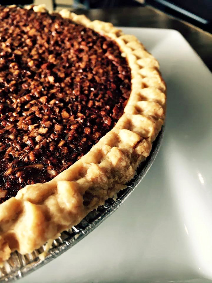 A perfect pecan pie speaks a universal language: "I was made with butter, care, and possibly magic."