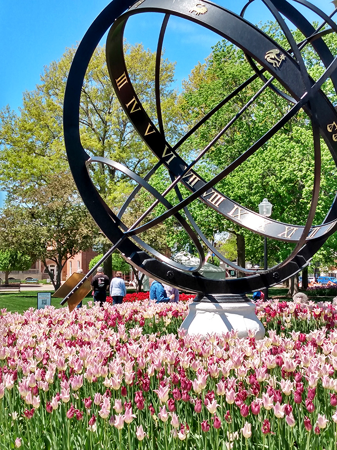This magnificent sundial, surrounded by a sea of tulips, proves that even time itself moves more beautifully in Pella.