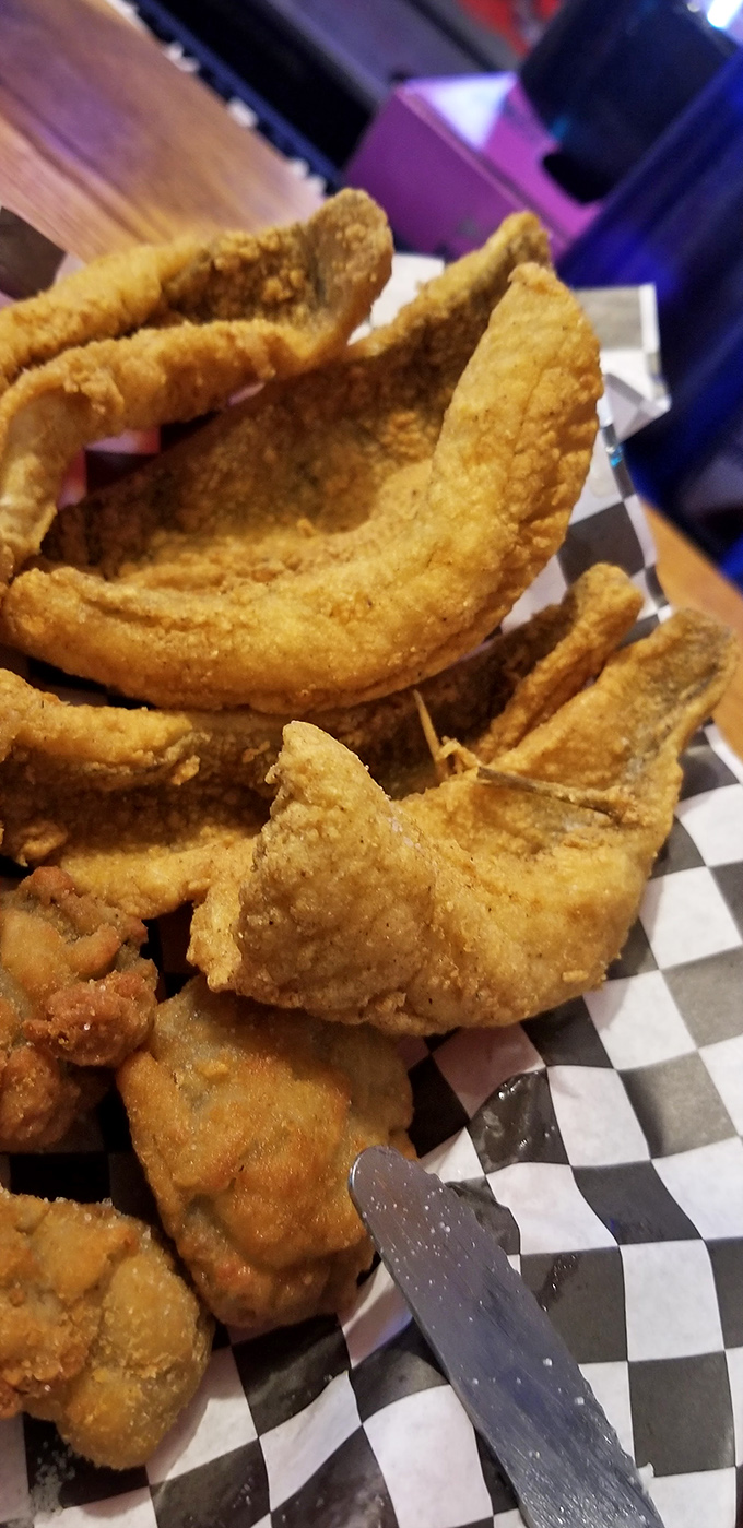 These golden perch fillets have the kind of crunch that makes people at neighboring tables suddenly develop food envy.