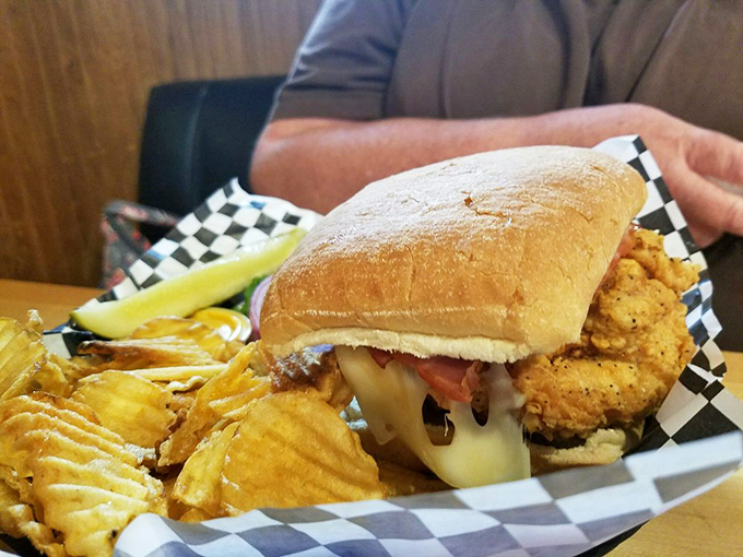 The fried chicken sandwich that makes you question your life choices. Why haven't you been eating this weekly? The crispy exterior practically sings.