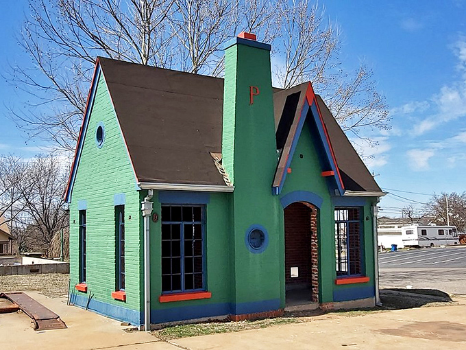 This mint-green cottage-style Phillips 66 station looks like it was plucked straight from a Wes Anderson film set.