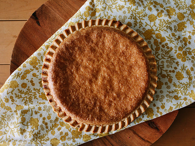 Some pies have crusts that snap like perfectly toasted bread. This one's edges are crimped with the precision of a master watchmaker.