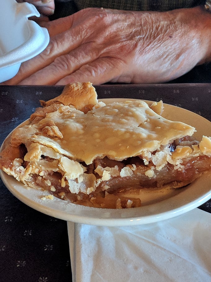 A slice of homemade apple pie that would make your grandmother both proud and jealous. Flaky crust and cinnamon-kissed filling steal the show.