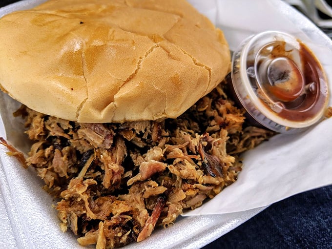 The pig sandwich comes with sauce on the side because when meat is this good, condiments know their place&mdash;as supporting actors.