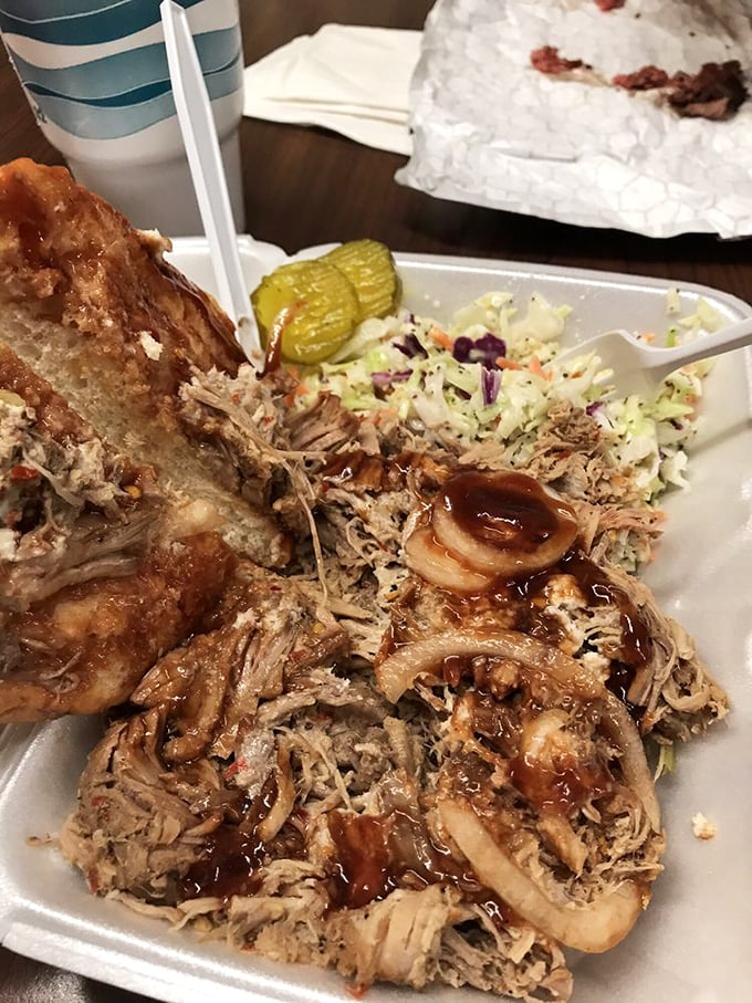 Pulled pork with that perfect bark, coleslaw adding crunch, and pickles providing the acid balance. It's the kind of culinary trinity theologians should study.
