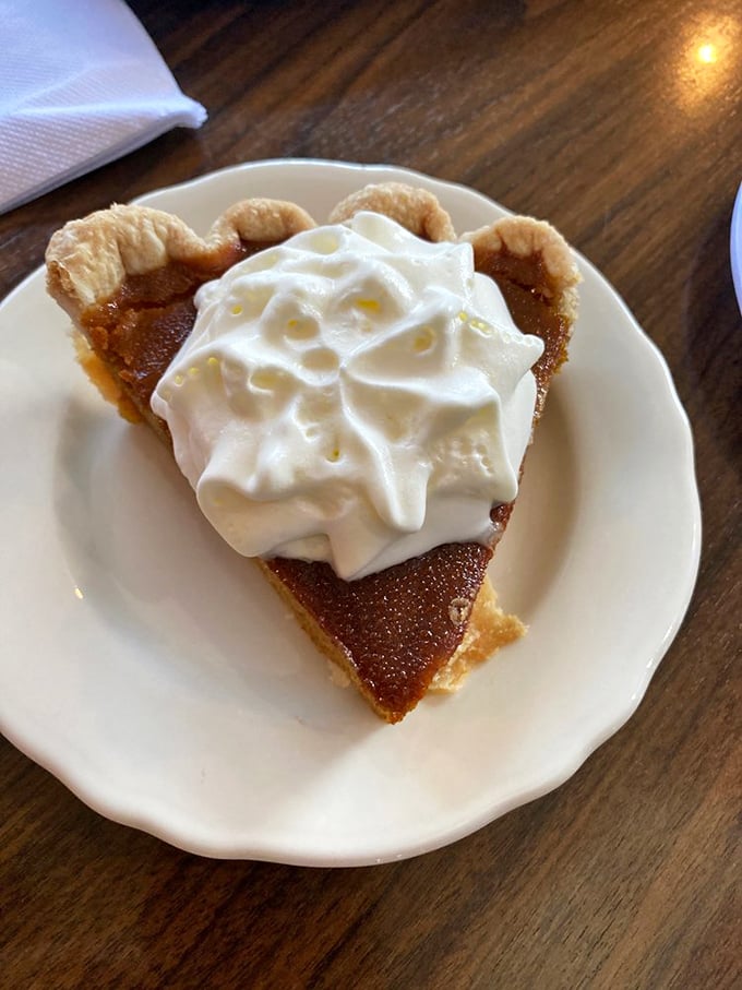 Pumpkin pie topped with a cloud of whipped cream&mdash;because vegetables absolutely count as dinner when they're this delicious.