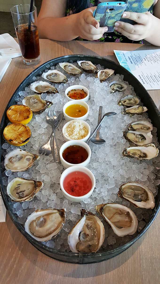 A circle of briny treasures from the sea, each oyster a perfect little package of oceanic bliss, accompanied by an array of sauces for your dipping pleasure.