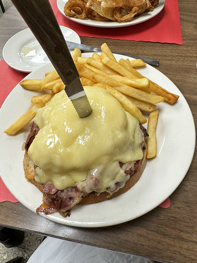 That knife isn't for sharing&mdash;it's for bisecting this monument to melted cheese and meat that makes Manhattan delis nervously look over their shoulders.