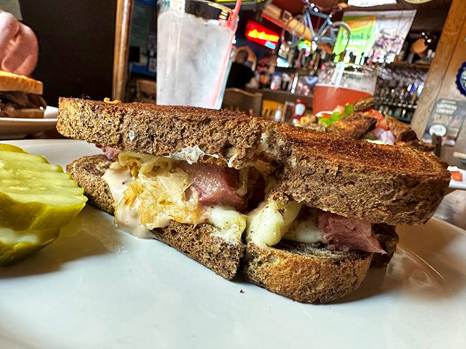 A cross-section that reveals the architecture of flavor. This isn't just a sandwich; it's edible engineering at its finest.