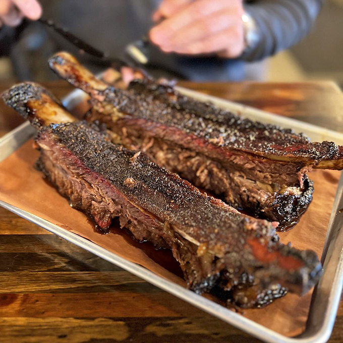 These ribs don't just fall off the bone—they practically leap onto your fork, begging to be devoured.