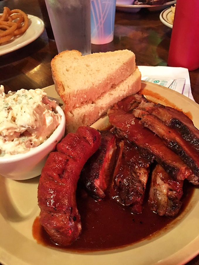 A BBQ trinity that would make any Texan nod in approval&mdash;ribs, sausage, and a side of potato salad that didn't come from anyone's supermarket deli.