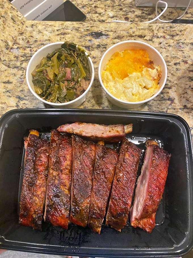 The holy trinity of Southern comfort: ribs with bark so perfect they should be in a museum, collards that grandma would approve of, and mac and cheese that's worth every calorie.