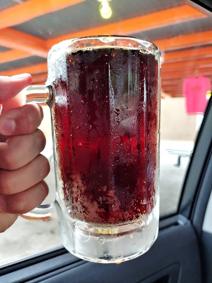The frosty root beer comes in mugs so cold they sweat with anticipation. The perfect companion to cut through the richness of their legendary dogs.