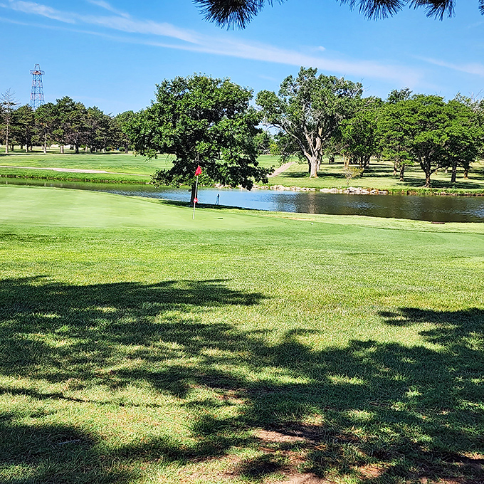 Russell's golf course offers the kind of lush green serenity that makes even terrible golfers like me forget we're slicing balls into water hazards.