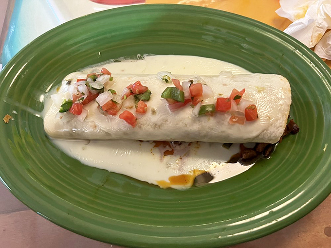 Behold the San Jose Burrito in all its glory&mdash;wrapped in white cheese blanket and topped with fresh pico de gallo. Resistance is futile, my friends.
