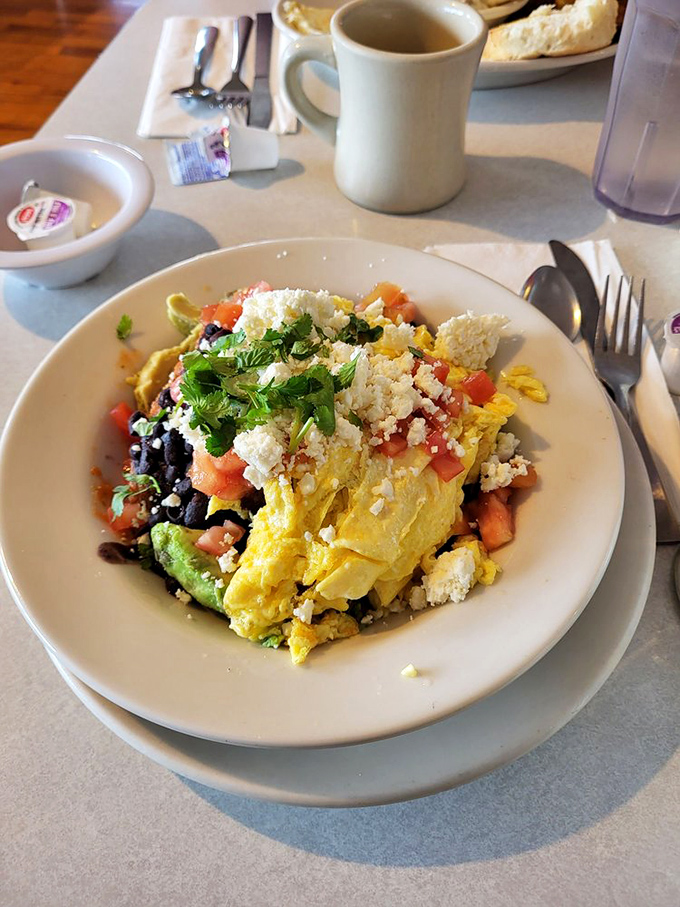 A fiesta for your taste buds &ndash; fresh avocado, black beans, and eggs mingle with feta cheese in this colorful breakfast bowl.
