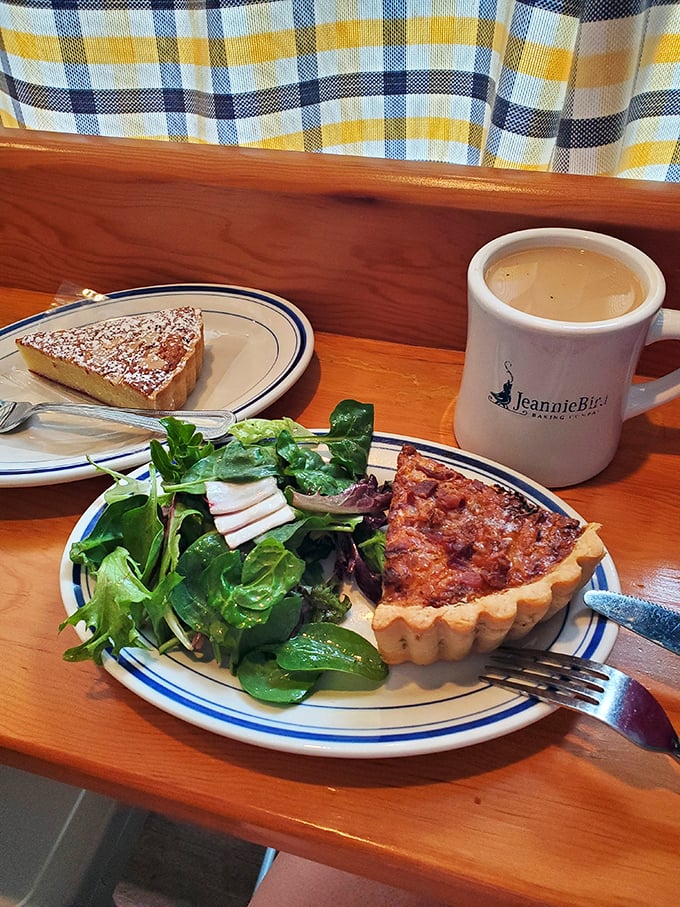 The perfect lunch trifecta: a savory quiche, fresh greens, and a sweet finale. It's like the food pyramid, but one you're actually excited about.