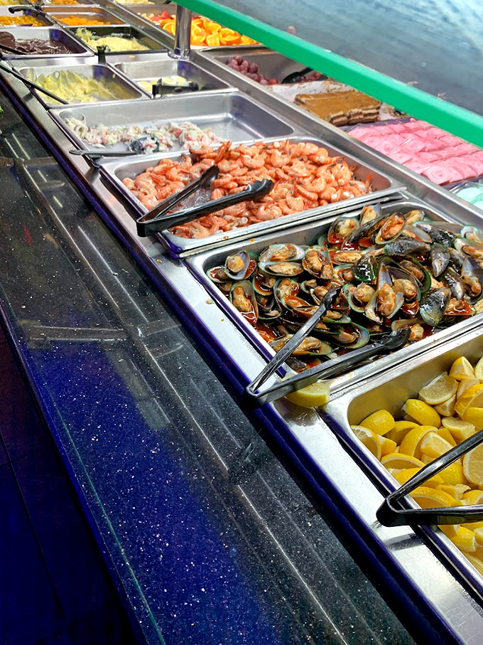 Seafood heaven calling all shellfish enthusiasts—these mussels, shrimp, and clams aren't just participating, they're competing for your attention.