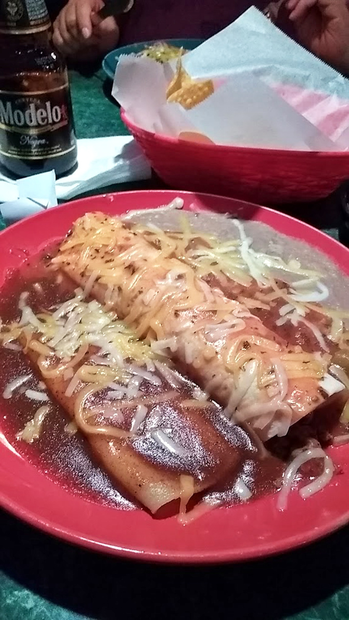 This enchilada, bathed in savory sauce and topped with melted cheese, makes a convincing case for booking your next vacation to Mexico City.