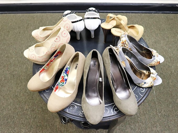 Ladies' heels arranged in a perfect circle &ndash; like a support group for shoes that have danced at weddings past.