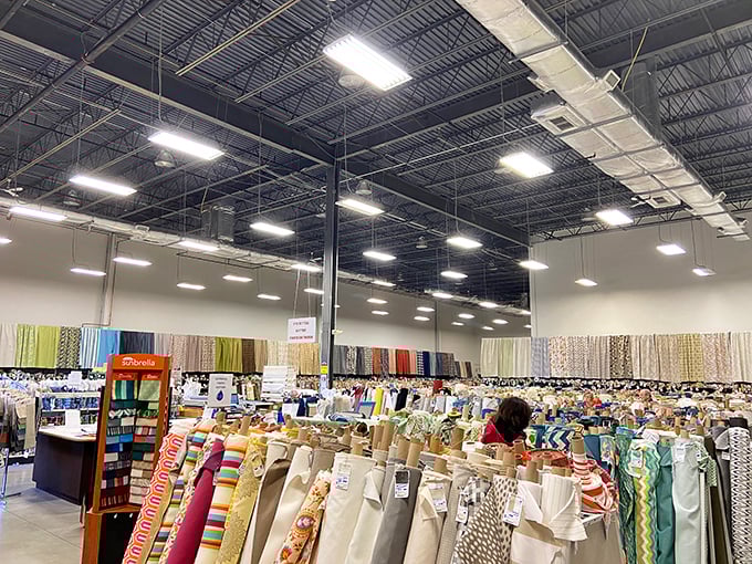 The high ceilings and industrial lighting create the perfect backdrop for this textile wonderland. Sensory overload in the best possible way.