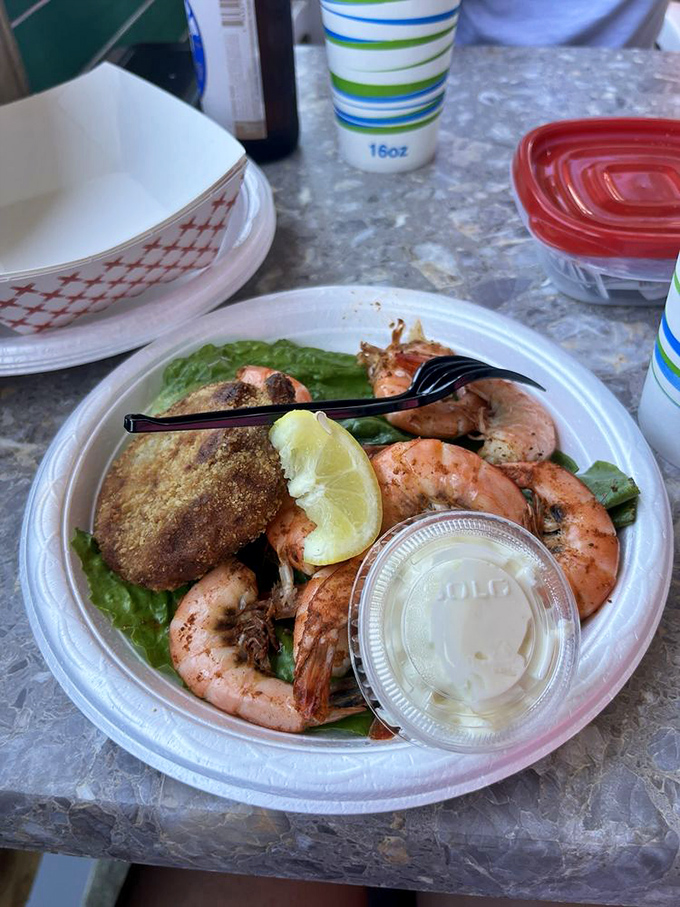 The perfect marriage &ndash; plump local shrimp and a crab cake sharing a plate like old friends reuniting for a beach weekend.