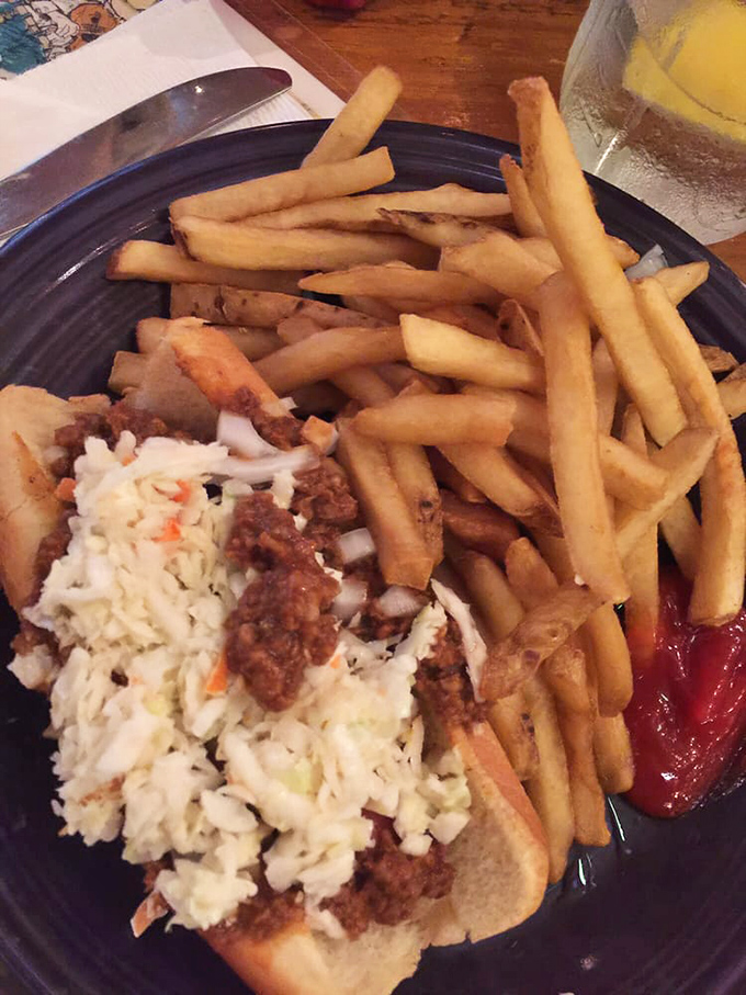 The humble slaw dog elevated to art form. Crispy fries standing at attention, ready to escort each bite to flavor town.