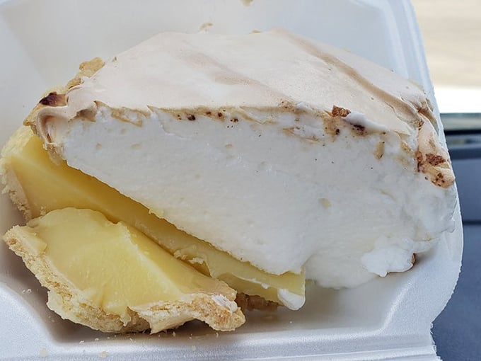 Lemon meringue pie so tall it needs its own zip code. That cloud of meringue is what dreams are made of.