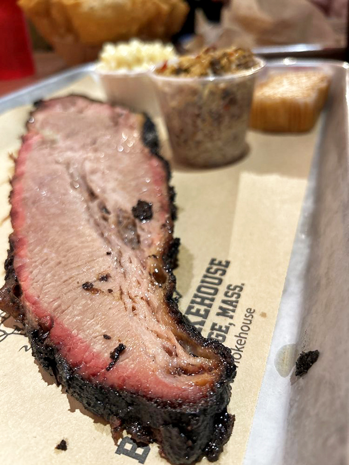 The holy grail of barbecue: perfectly smoked brisket with that pink smoke ring. This is what patience tastes like, folks.