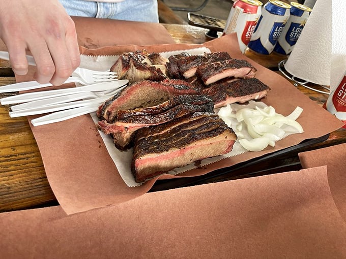 Behold the holy trinity of Texas barbecue &ndash; perfect bark, rosy smoke ring, and meat so tender it practically surrenders at the sight of your fork.
