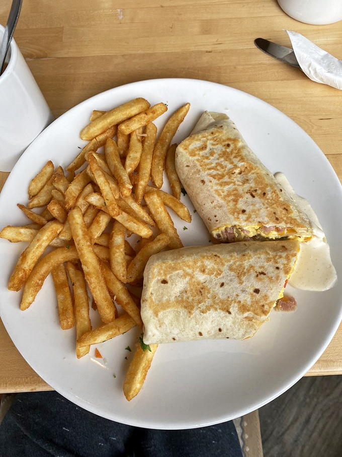 
The breakfast burrito and fries combo&mdash;proof that sometimes the simplest pleasures are the most profound. This isn't a meal; it's a morning revelation.