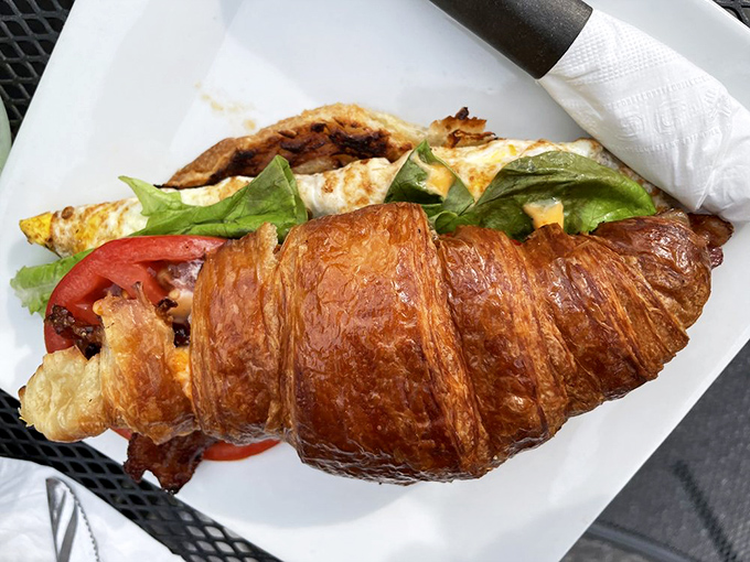 The croissant BLT proves that breakfast and lunch should stop fighting and just get married already. That golden pastry deserves its own fan club.