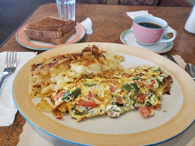 When spinach, feta, and tomato get together in an omelet, it's like a Mediterranean vacation without the passport or the sunburn.