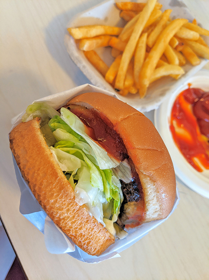 This isn't just lunch; it's edible nostalgia. The Steakburger with its special sauce, crispy fries, and that little cup of ketchup&mdash;perfection in paper.