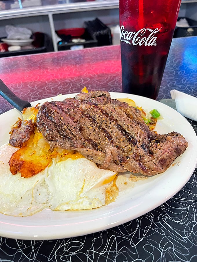 This isn't just steak and eggs; it's morning salvation on a plate&mdash;perfectly seared beef alongside sunny eggs that practically high-five your taste buds.