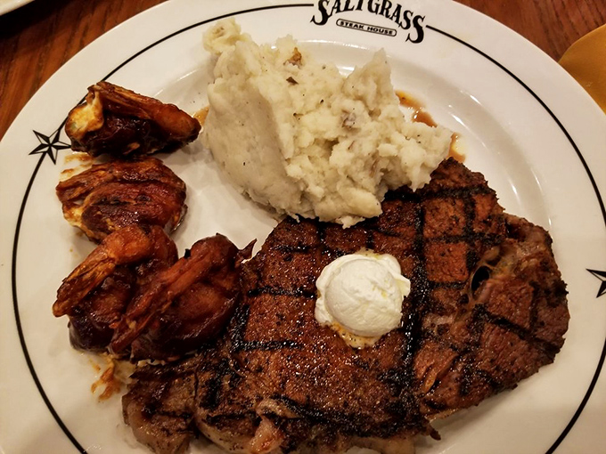 When your steak arrives with those grill marks looking like they were applied by an artist who takes beef very, very seriously.