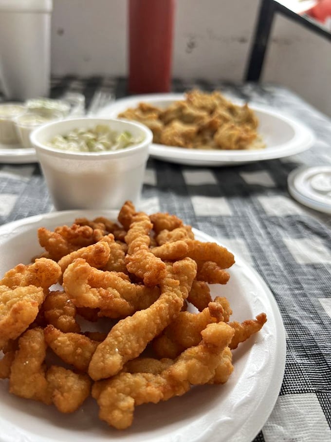 Super Strip Clams&mdash;little golden nuggets of oceanic delight served with crackers. Simple pleasures are often the most profound.