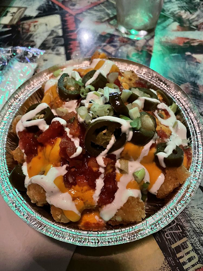 Tatchos: Where nachos and tater tots had a beautiful baby that was raised by jalape&ntilde;os and cheese.