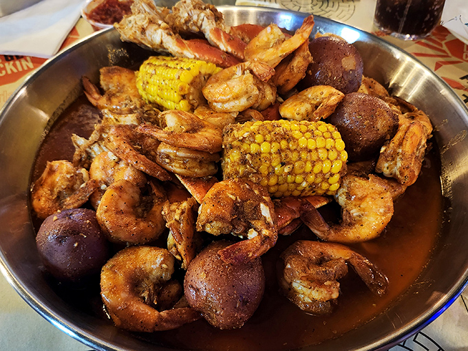 This seafood boil isn't just a meal; it's an event. Shrimp, potatoes, and corn swimming in spices that would make Neptune himself reach for a cold drink.