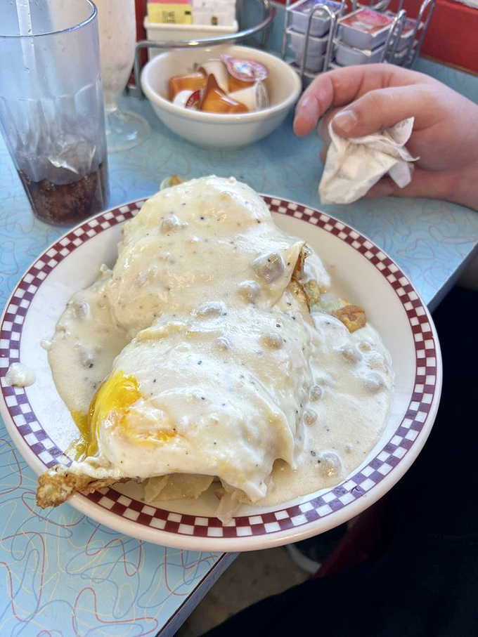 The Super Matt's isn't just breakfast, it's an architectural achievement of gravy, eggs, and potatoes that would make Frank Lloyd Wright weep with joy.