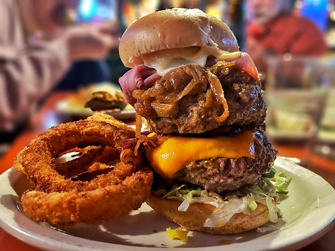 The Thurmanator stands tall like Ohio's unofficial food monument, flanked by cheese-smothered fries that refuse to be mere sidekicks in this epic meal.