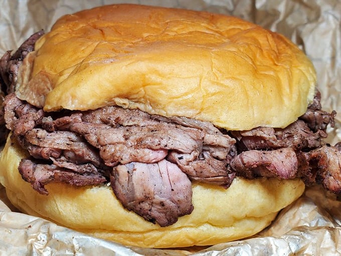Behold the Baltimore handshake: thinly-sliced pit beef on a kaiser roll. The kind of sandwich that ruins you for ordinary lunch forever.