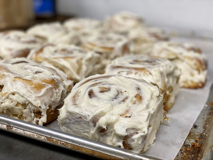 Not all heroes wear capes. Some wear oven mitts and produce trays of cinnamon rolls that make grown adults weep with joy.