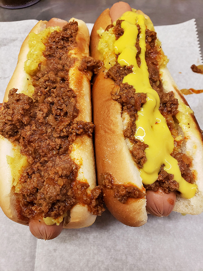 Two chili dogs with mustard&mdash;the yellow river of tangy goodness cutting through that famous meaty chili like sunshine after a storm.